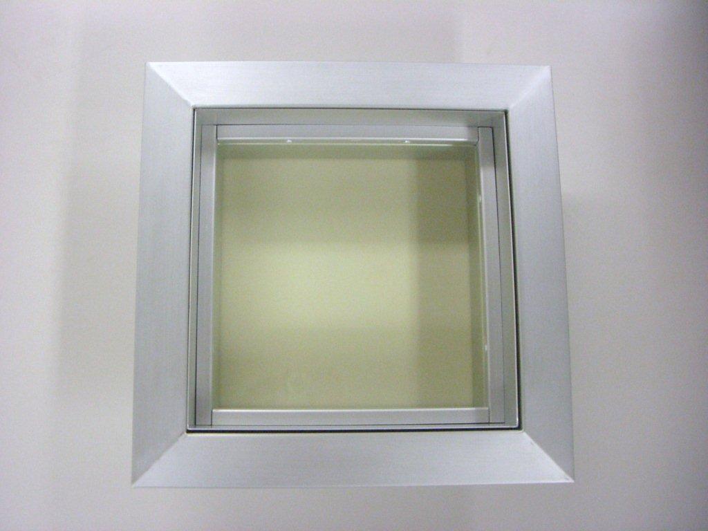 Telescopic X-Ray Control Windows for Imaging Rooms